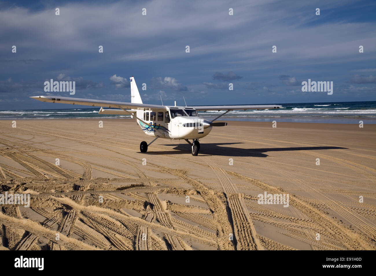 Plane on the beach Stock Photo - Alamy