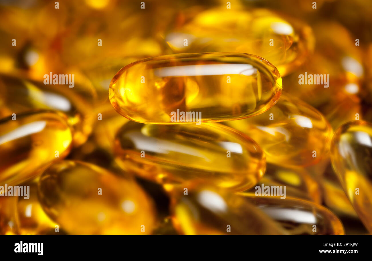 Close up of fish oil capsules Stock Photo - Alamy