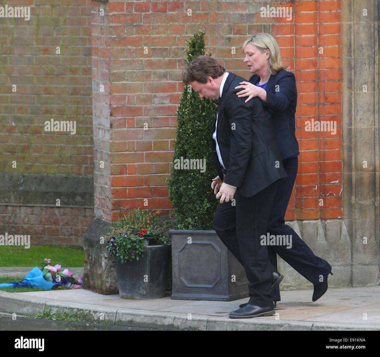 A distraught Ian Beale leves the church after daughter Lucy's funeral ...