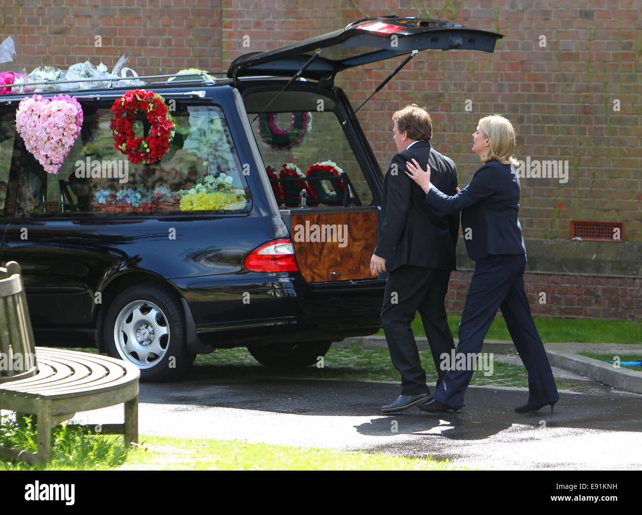 A distraught Ian Beale leves the church after daughter Lucy's funeral ...