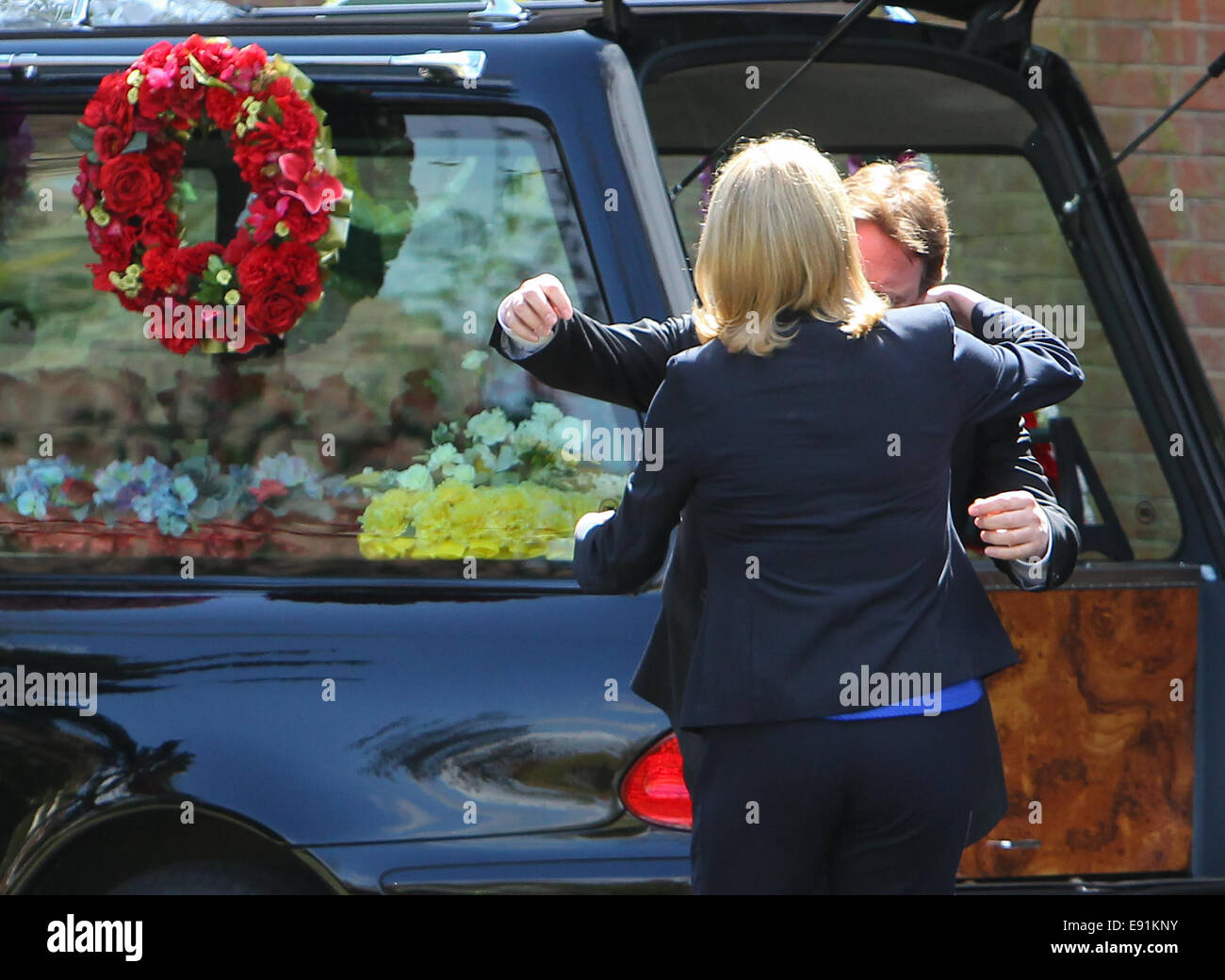 A distraught Ian Beale leves the church after daughter Lucy's funeral ...