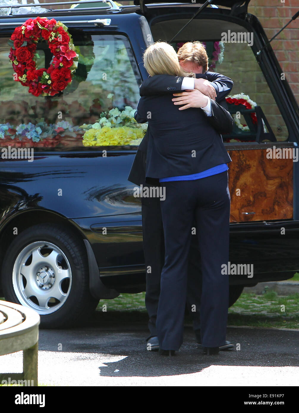 A distraught Ian Beale leves the church after daughter Lucy's funeral ...