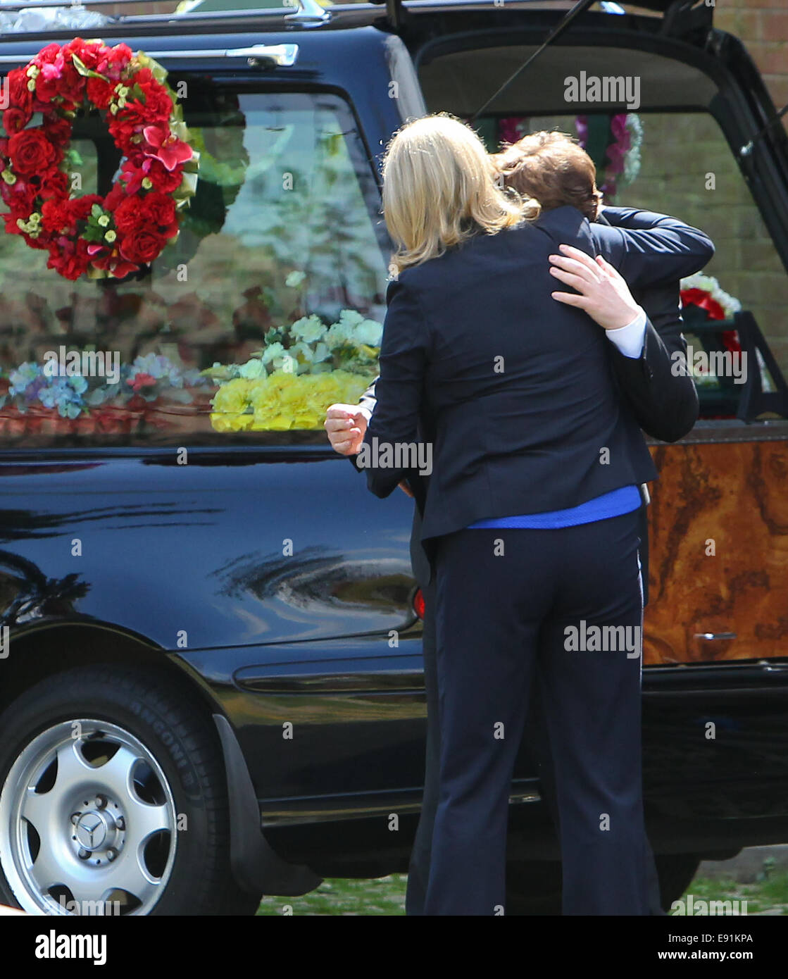 A distraught Ian Beale leves the church after daughter Lucy's funeral ...