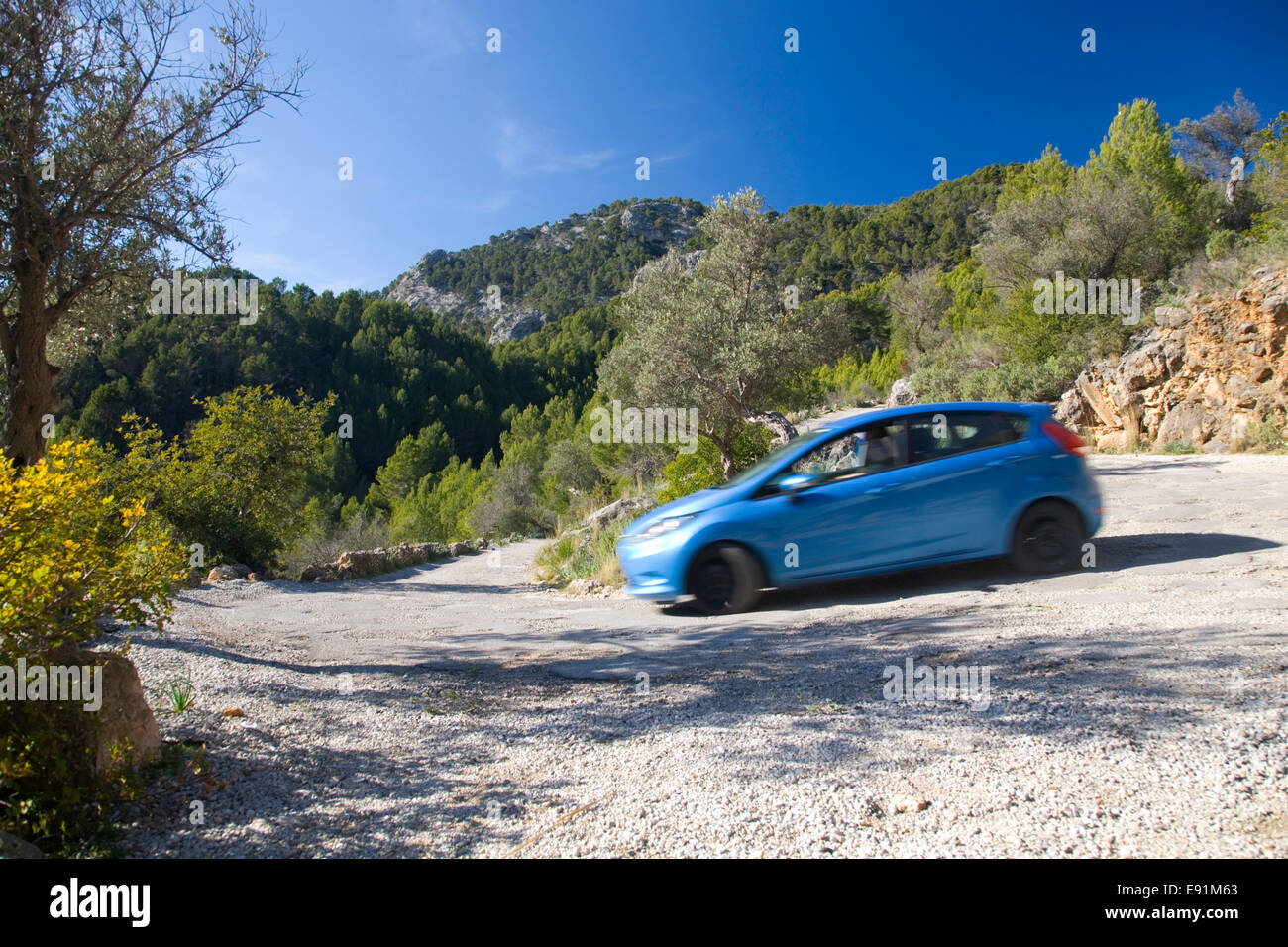 Car taking corner at speed hi-res stock photography and images - Alamy