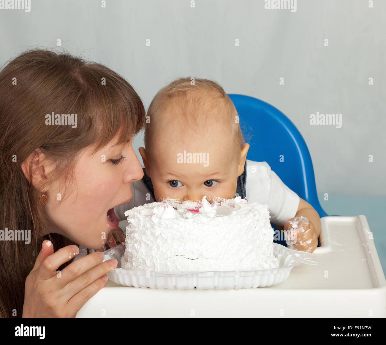 Mom son eating birthday cake hi-res stock photography and images - Alamy