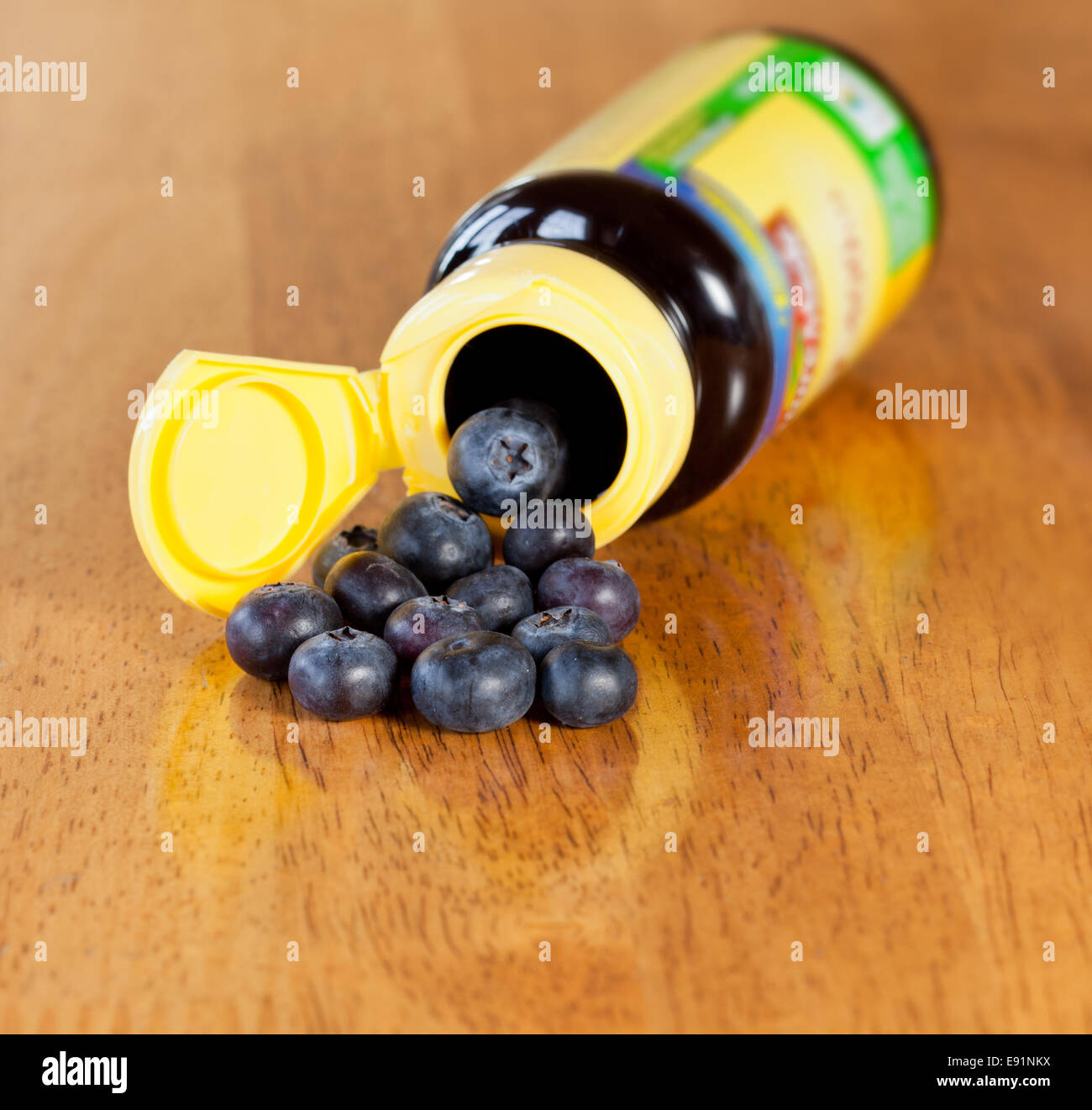 Blueberries in drug bottle Stock Photo - Alamy