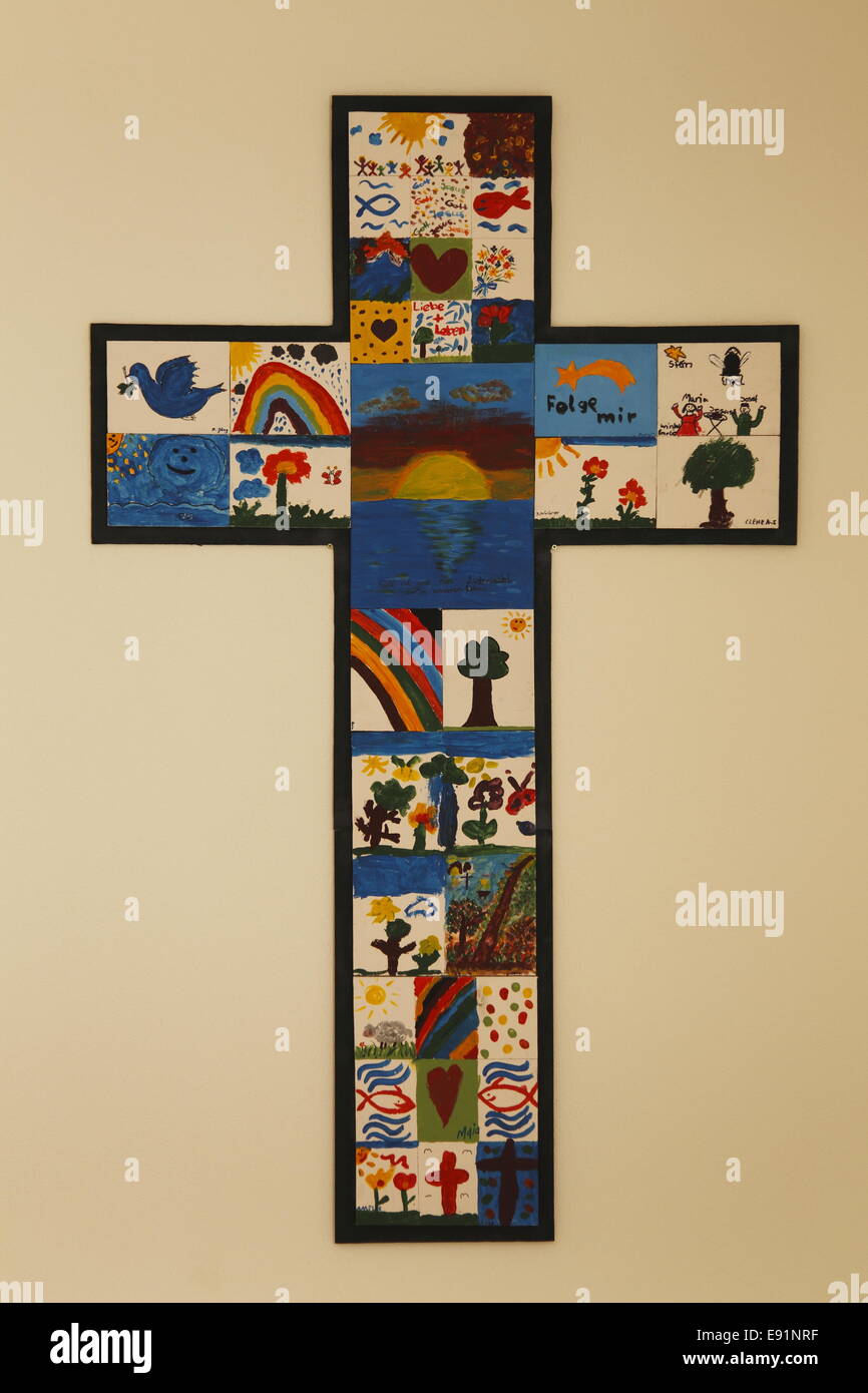 Colourful cross painted by children Stock Photo - Alamy