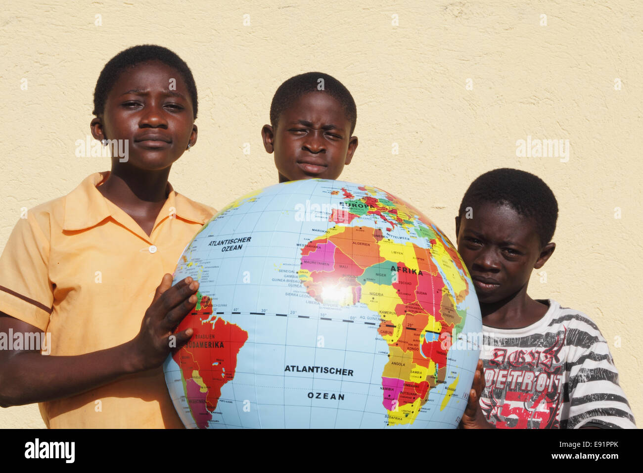 Ghanaian Kids with Globe showing Africa Stock Photo - Alamy