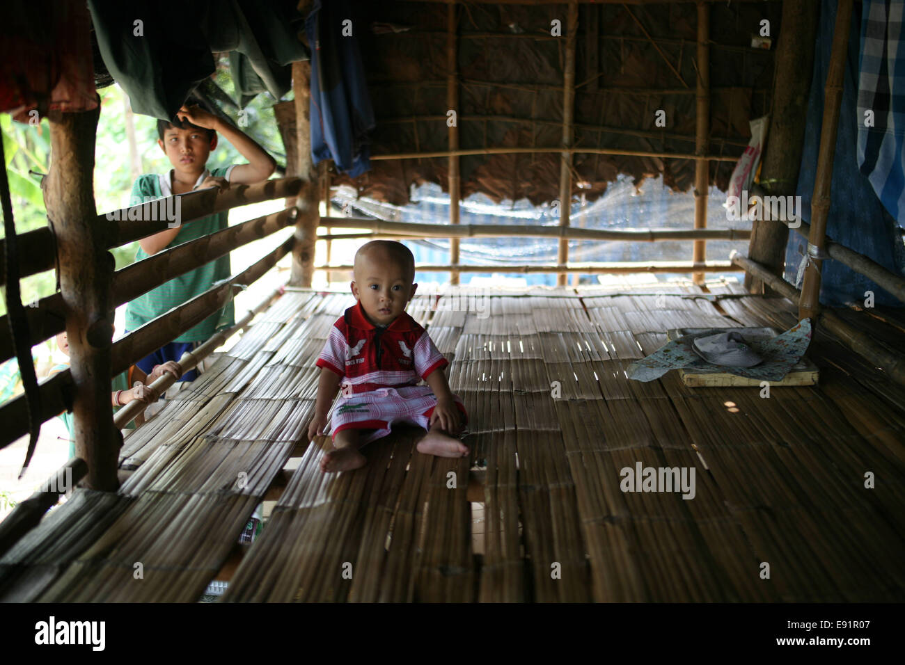 Mae Ramat, Thailand. 17th Oct, 2014. A child of Burmese migrant workers ...