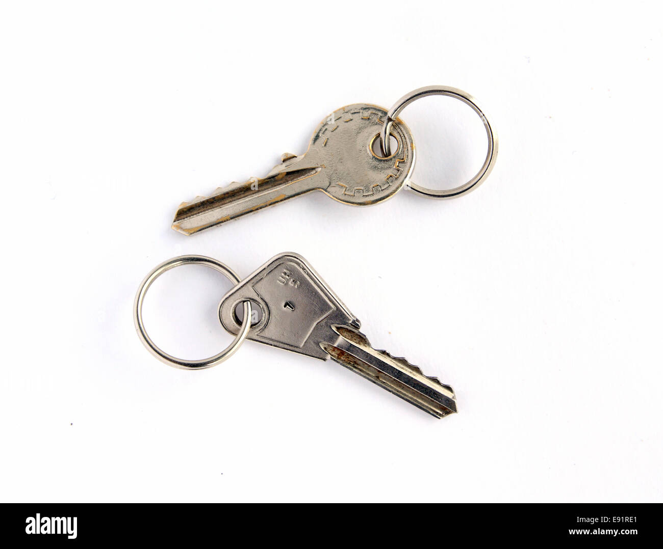two keys on white background Stock Photo - Alamy