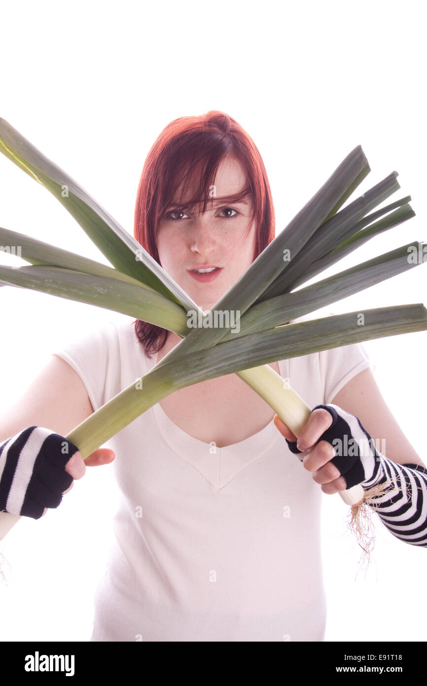 Woman messing around with vegetable Stock Photo - Alamy