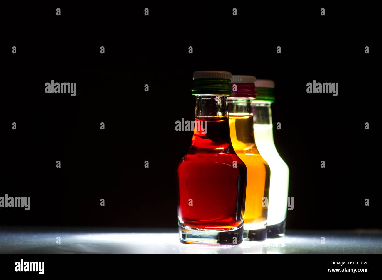 three little bottles Stock Photo - Alamy