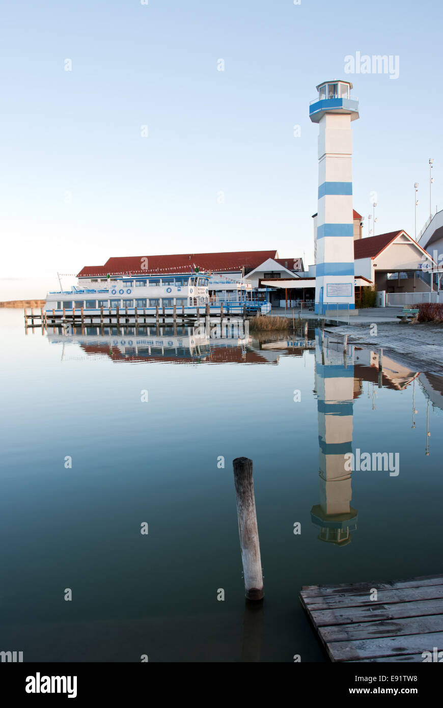 Harbor basin at the lake with lighthouse Stock Photo - Alamy