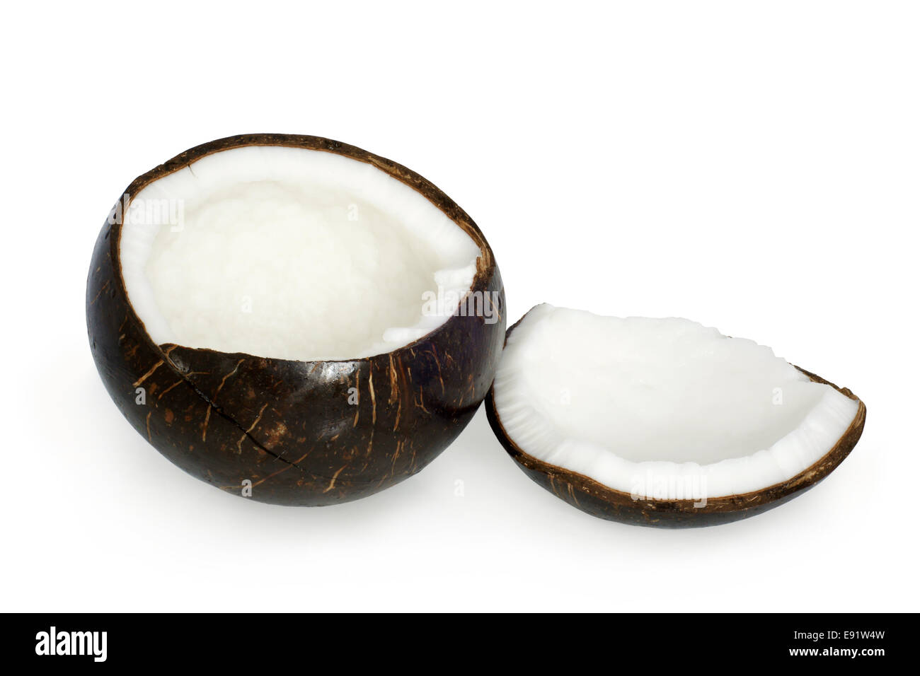 Two halves of coconut Stock Photo - Alamy