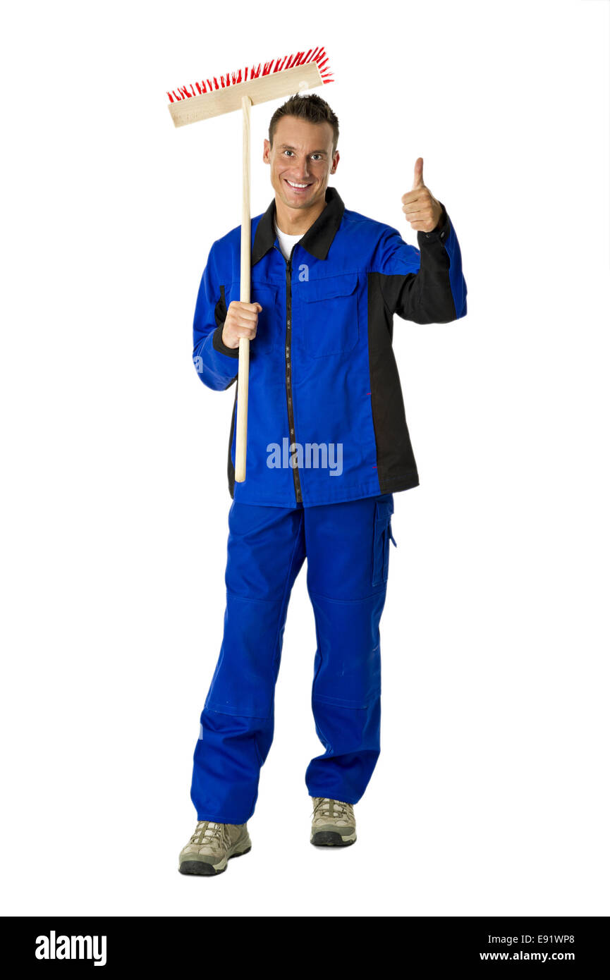 Workers with broom Stock Photo - Alamy