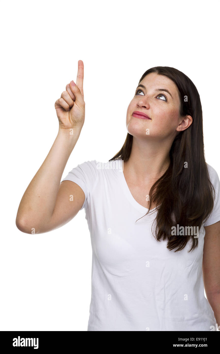 Young woman pointing up Stock Photo - Alamy