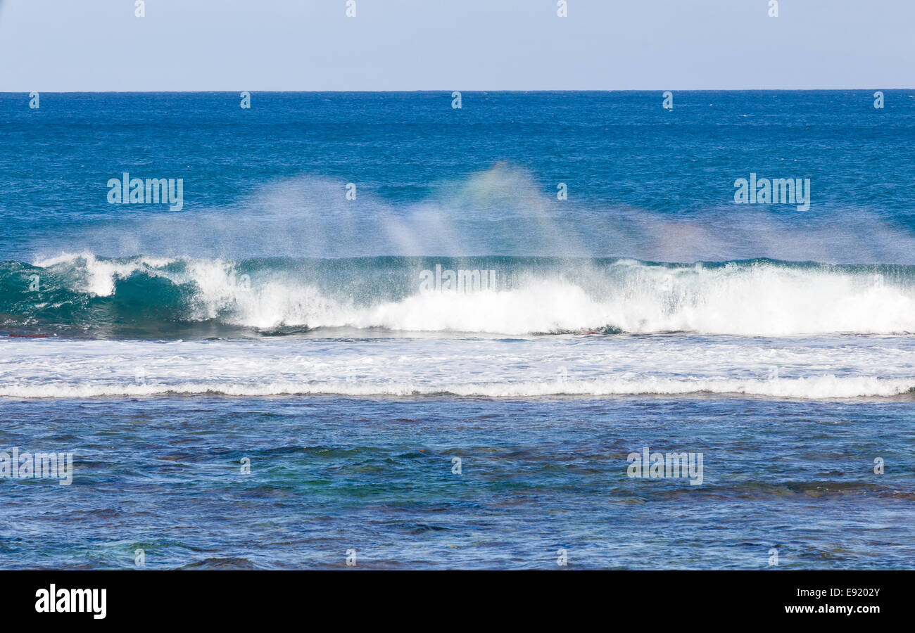Rainbow colors in spray from waves Stock Photo - Alamy
