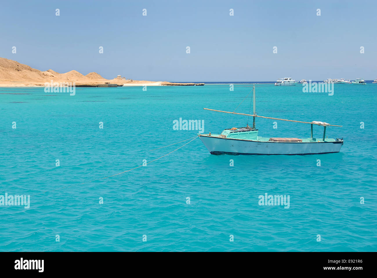 Boat on blue sea water in Egypt Stock Photo - Alamy