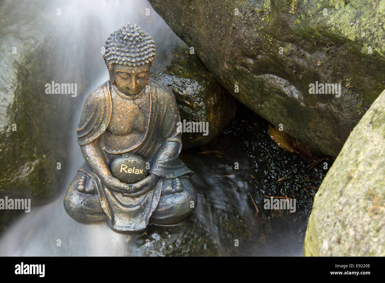 Buddha Meditation by the waterfall Stock Photo - Alamy