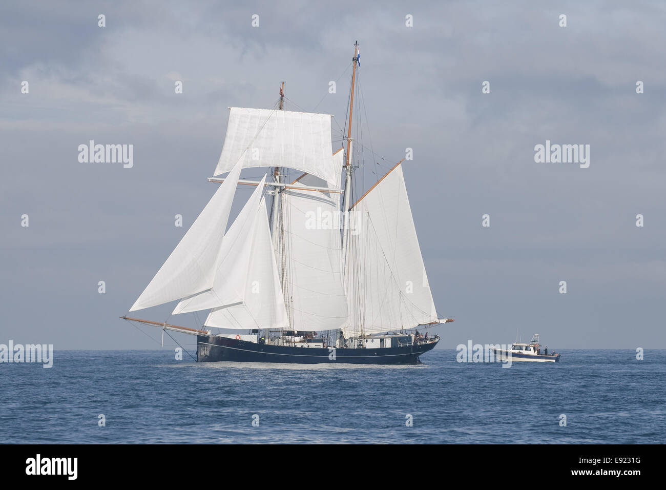 Big schooner and small cutter following it Stock Photo - Alamy