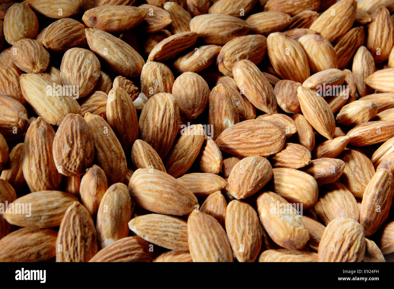 Texture of fried nuts Stock Photo - Alamy