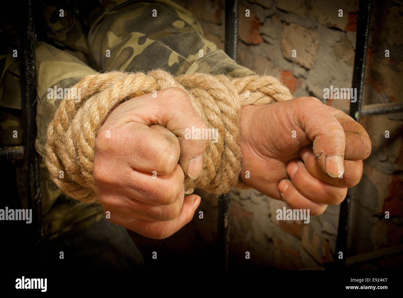 Man hands tied rope hi-res stock photography and images - Alamy