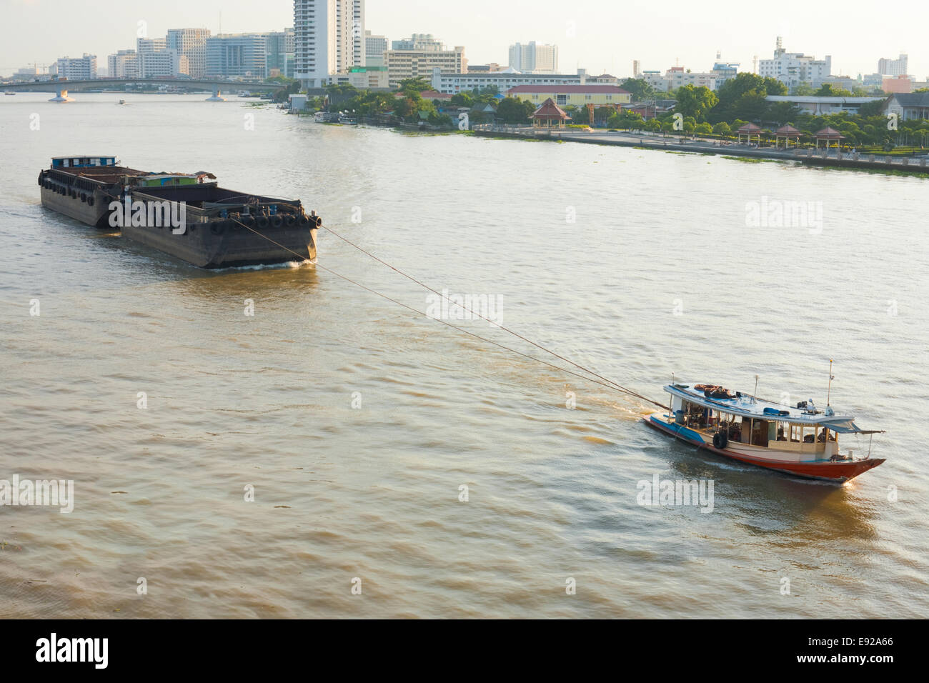 Tugboat Pulling Barge Stock Photo - Alamy