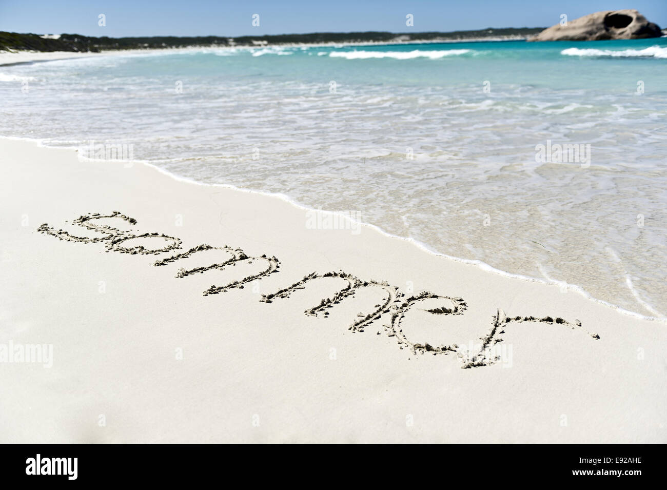 Summer written in sand Stock Photo - Alamy