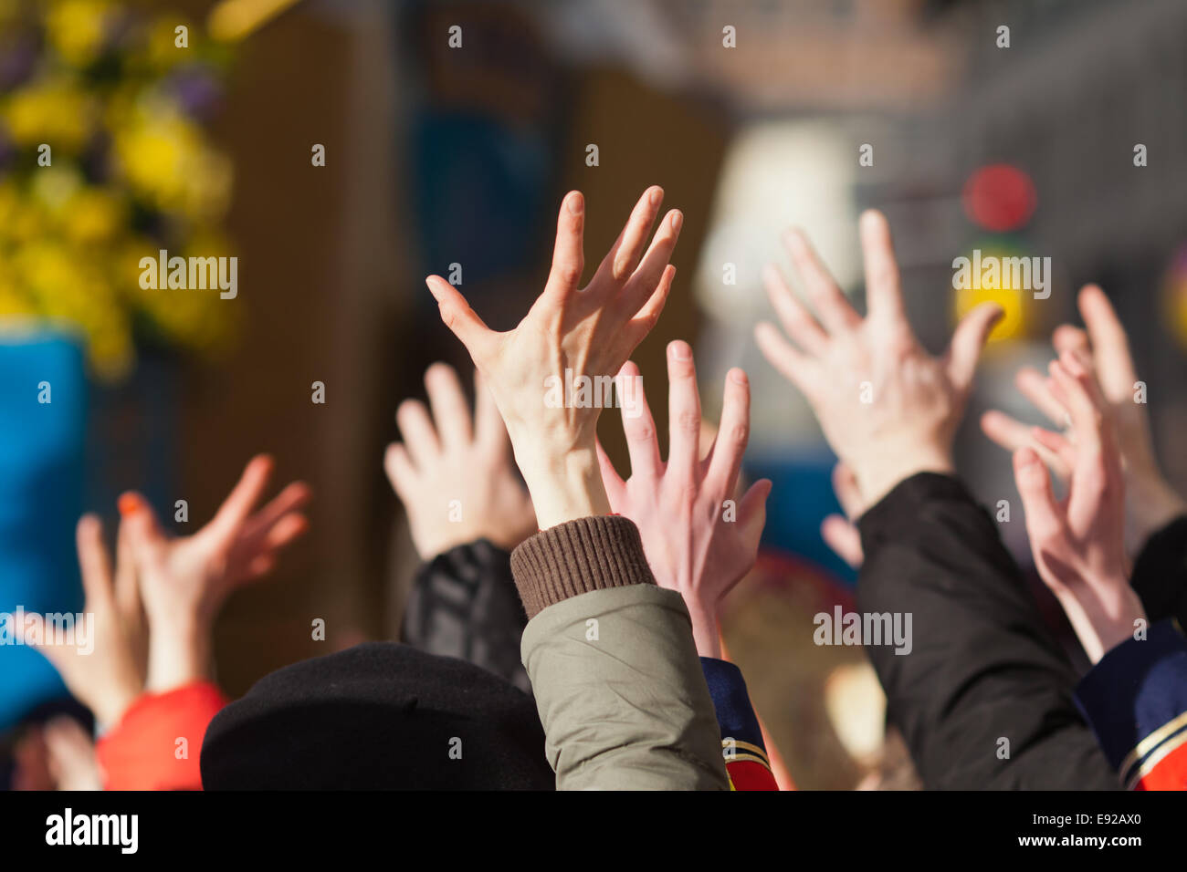 the crowd raises their hands Stock Photo - Alamy