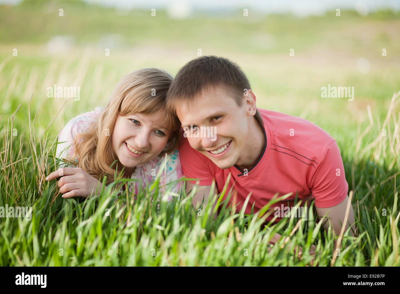 Happy couple on nature Stock Photo - Alamy