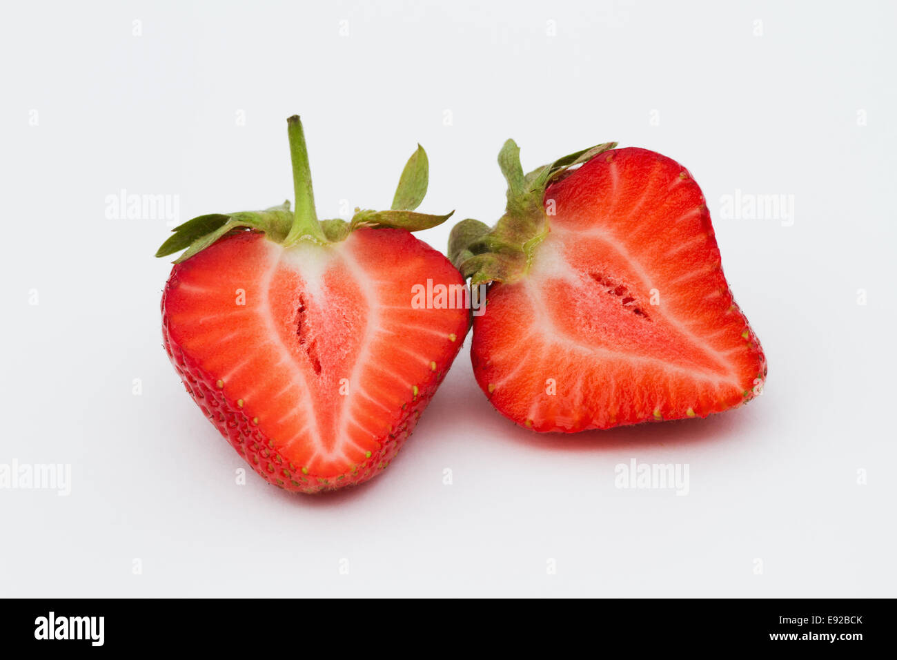 Strawberry halves hi-res stock photography and images - Alamy