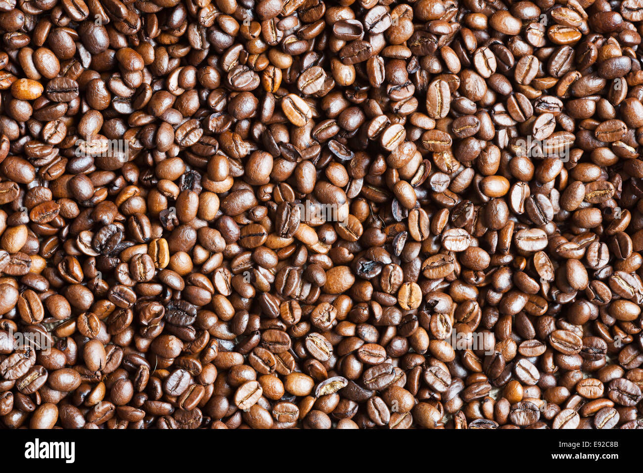 coffee beans as background texture Stock Photo - Alamy
