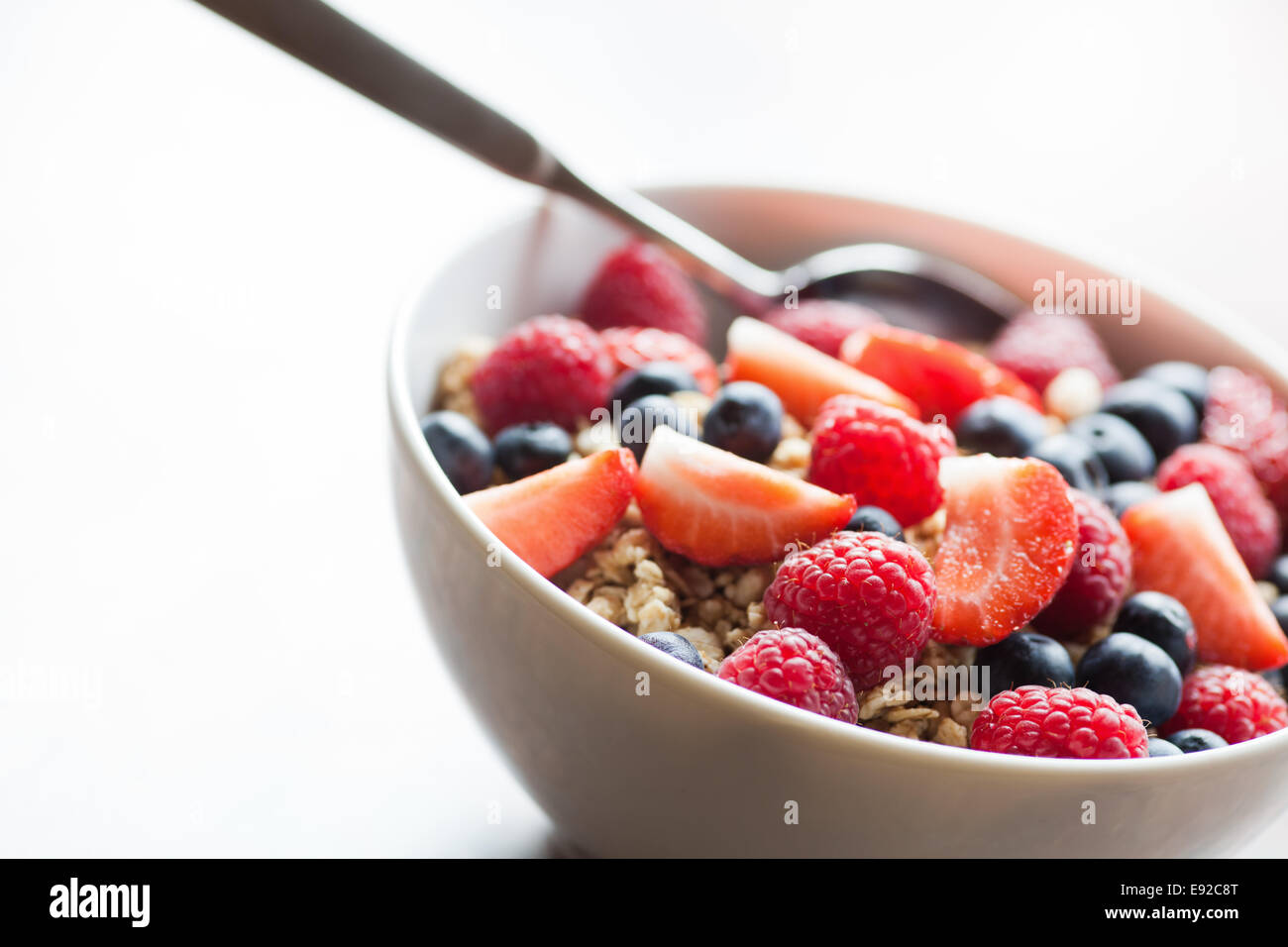 fruit muesli in a bowl Stock Photo - Alamy