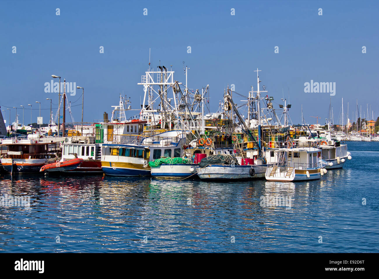 Fishing boats fleet in Harbor Stock Photo - Alamy