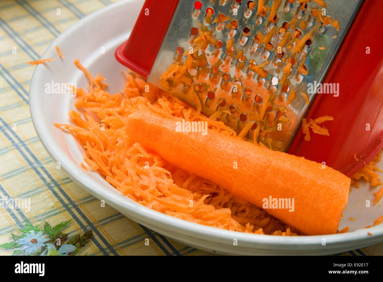 Grated carrots hi-res stock photography and images - Alamy