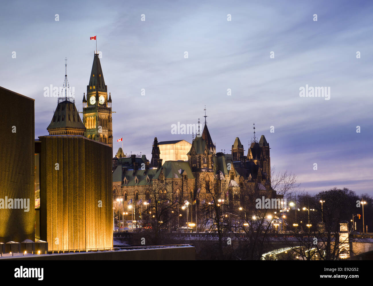 Parliament ottawa canadian clock flag maple leaf dusk hi-res stock ...