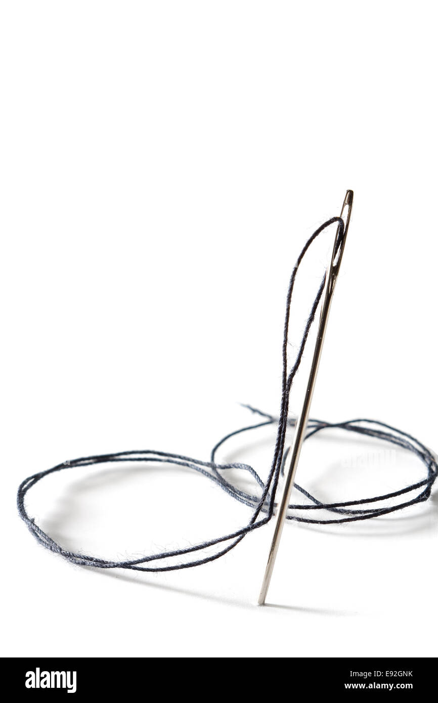 Needle and thread Stock Photo - Alamy