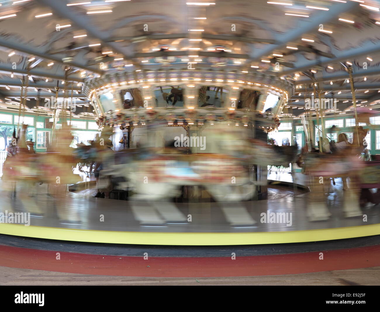 Fast moving carousel at Glen Echo park Stock Photo - Alamy