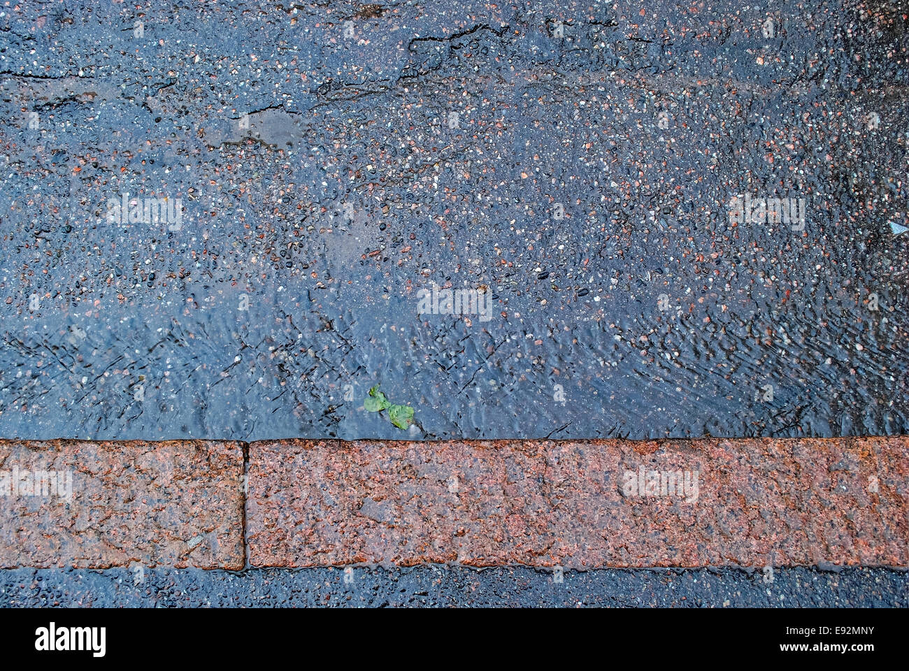 Wet asphalt road on city pavement on a rainy summer day Stock Photo - Alamy