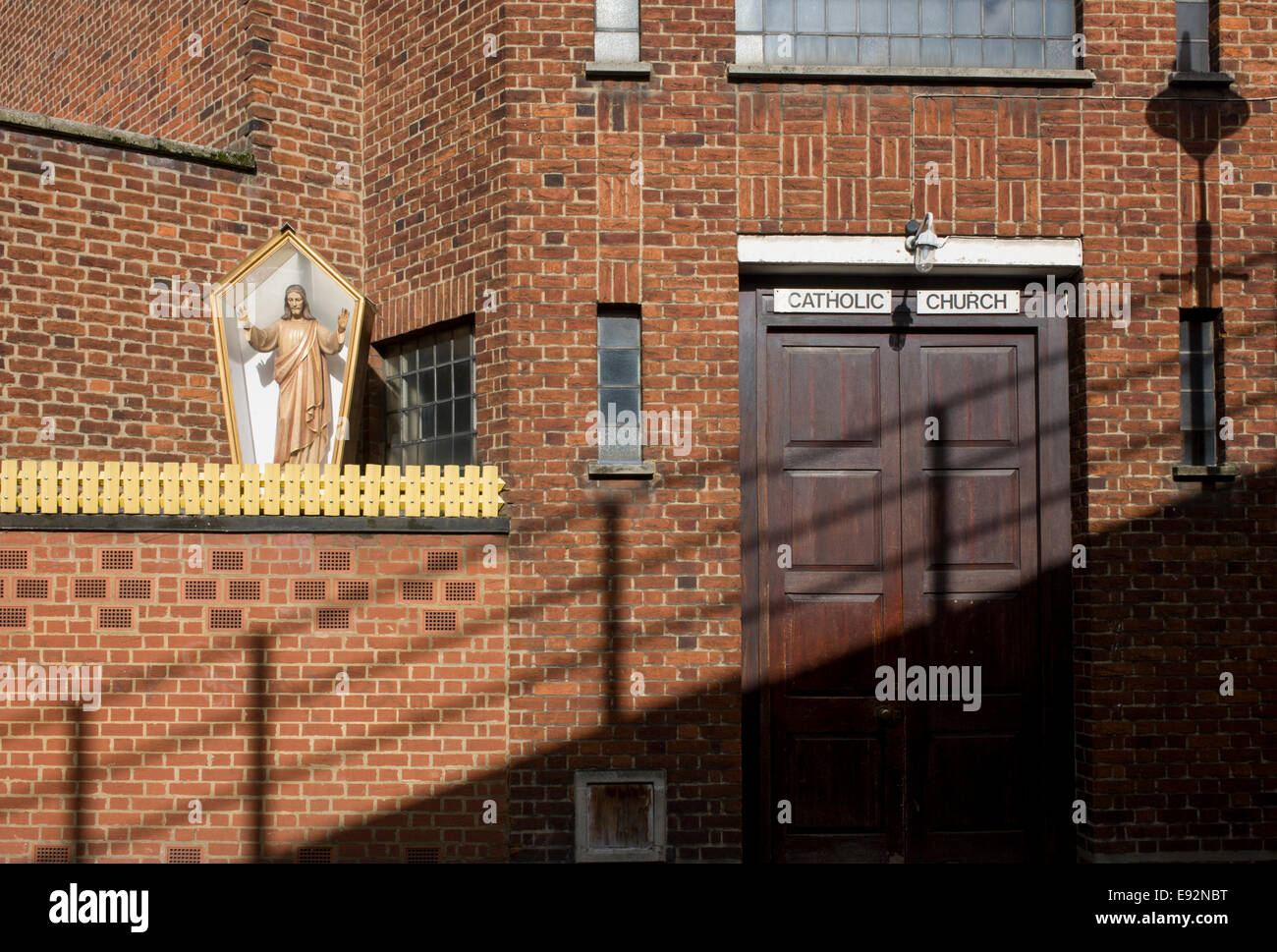 An effigy of Jesus Christ encased in a shrine box outside a Catholic ...