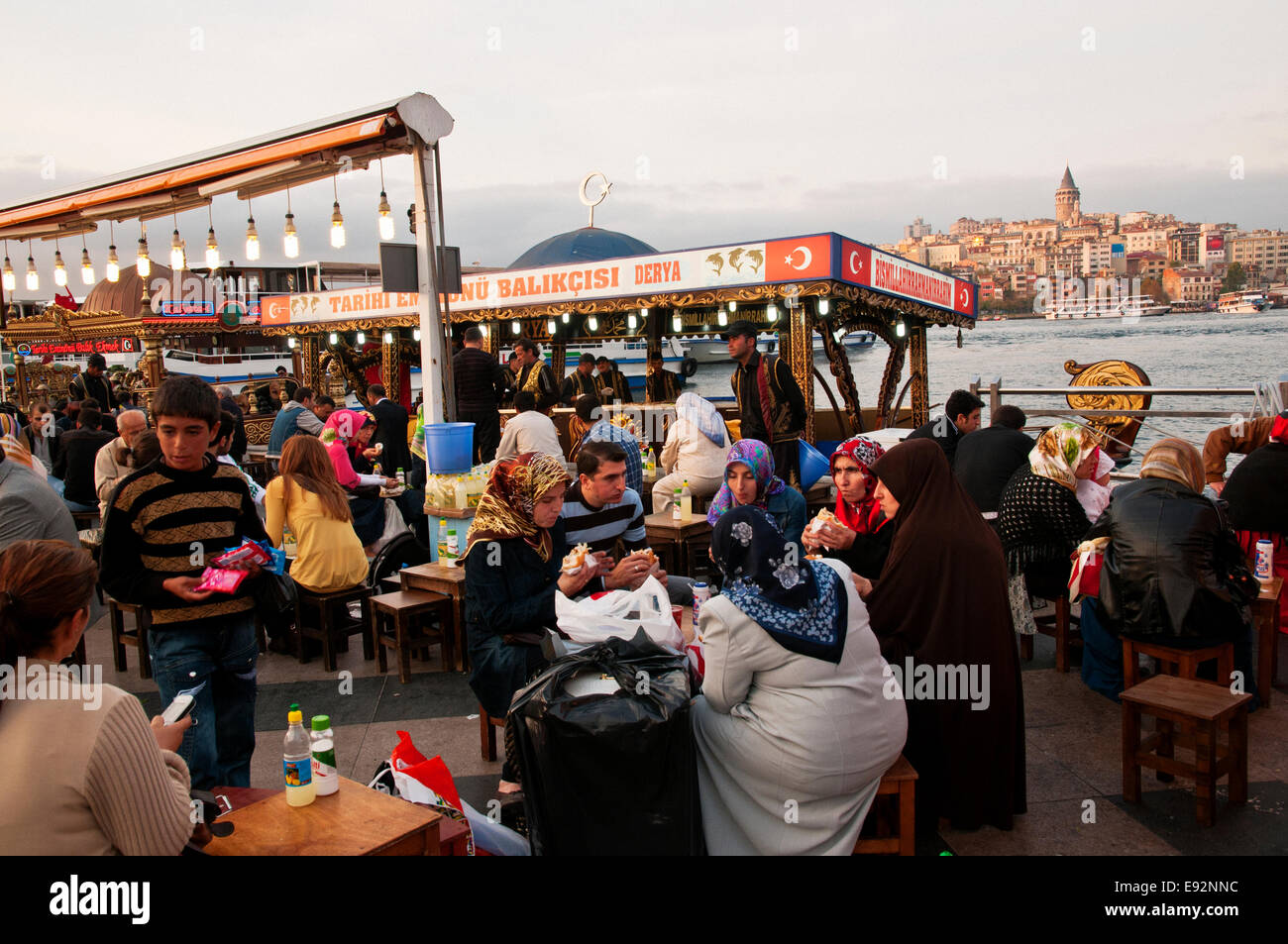 Traditional fast food restaurant by the Bosphorous with the Galata ...