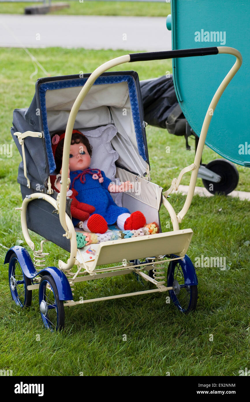 Retro Pram with a doll Stock Photo - Alamy