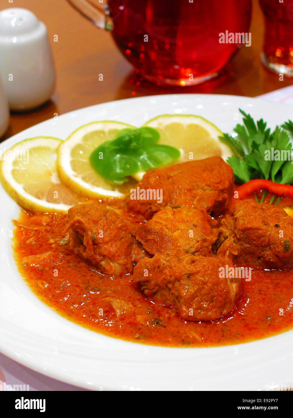 Beef in red sauce Stock Photo - Alamy
