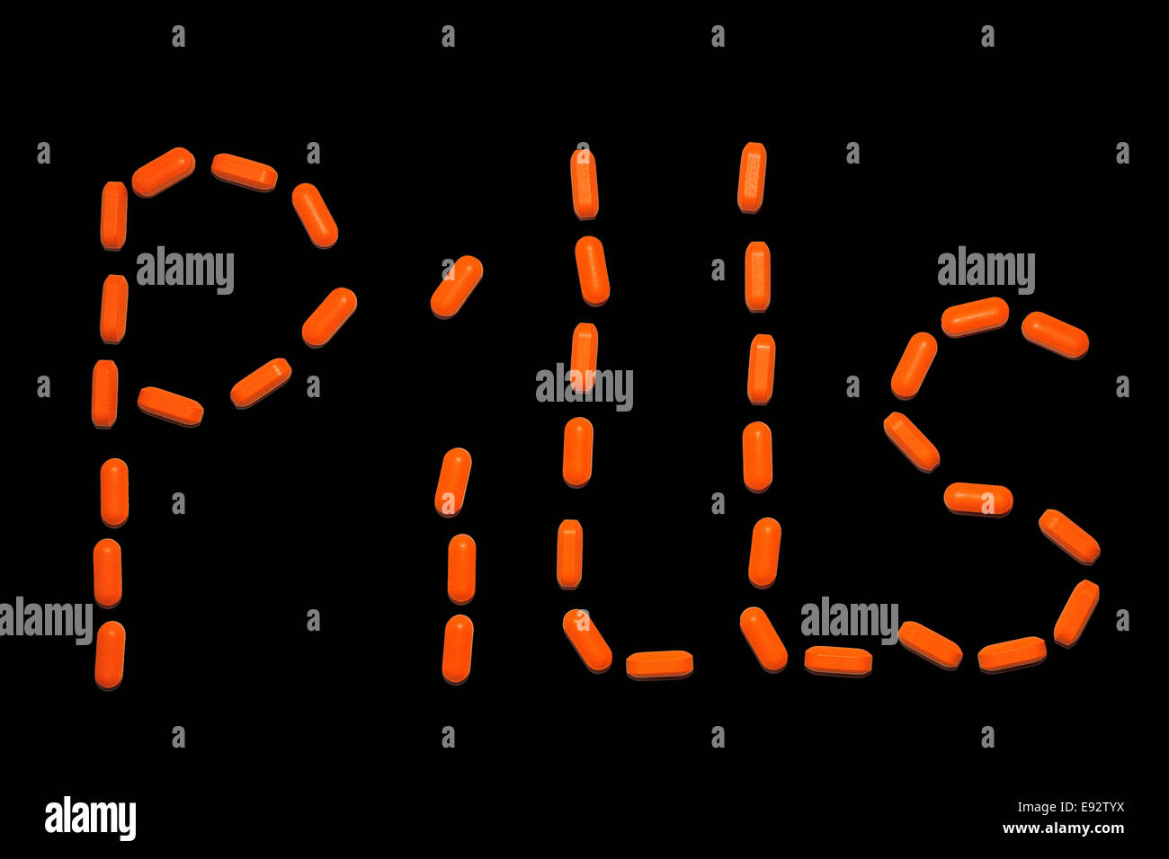 An image of the word pills made from orange medical pills against a ...