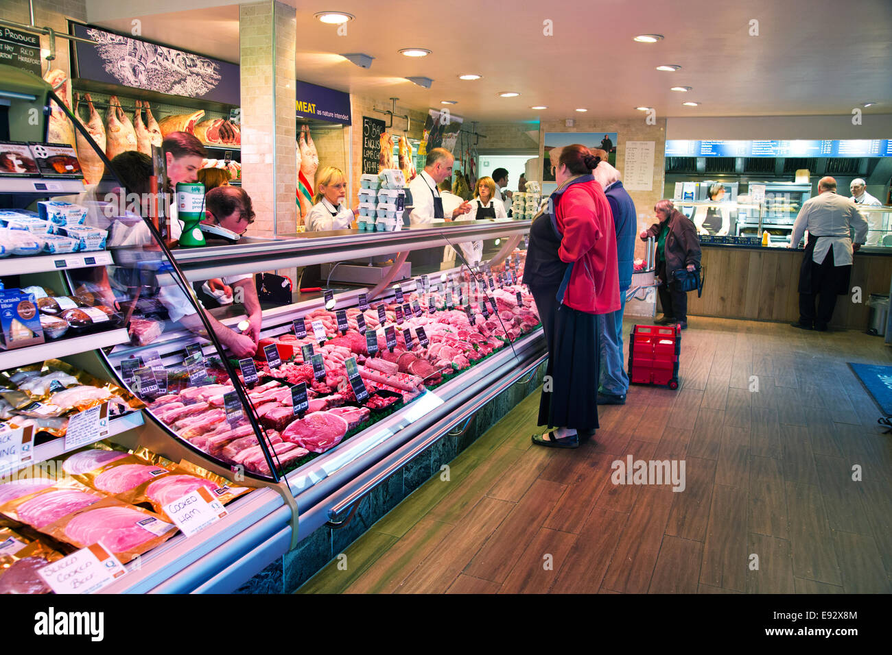 A Meat counter in a butchers shop Stock Photo - Alamy