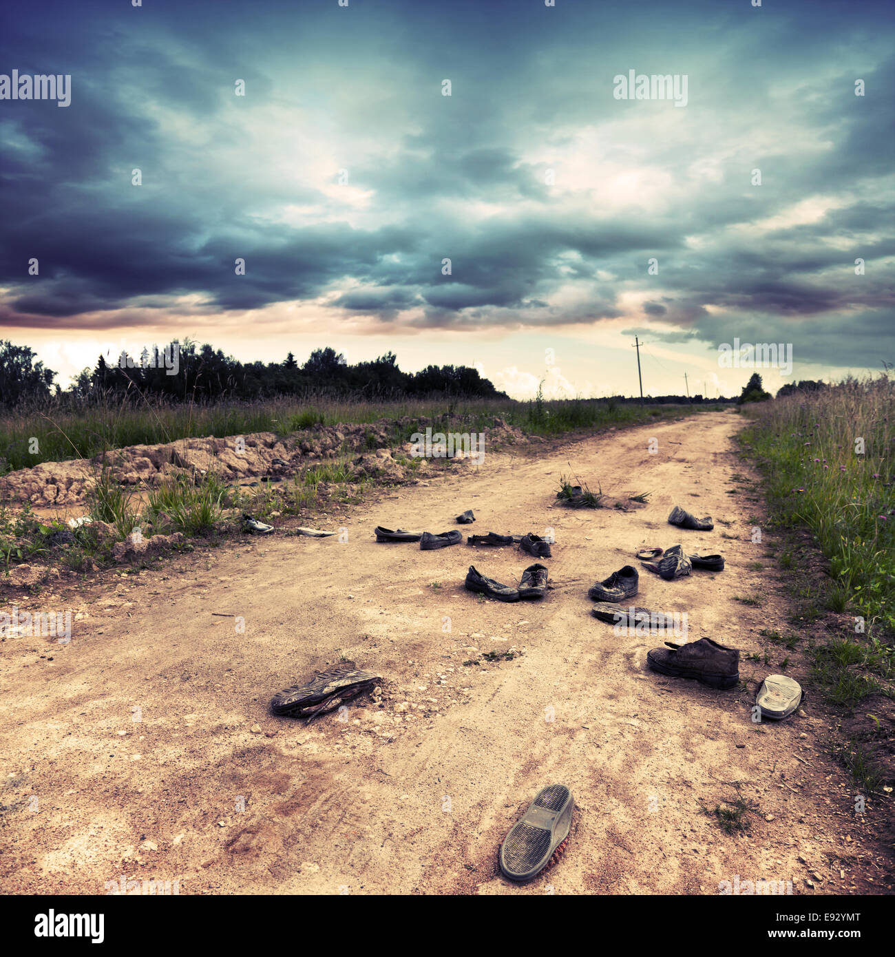 Old rural road with abandoned shoes. Toned effect Stock Photo - Alamy