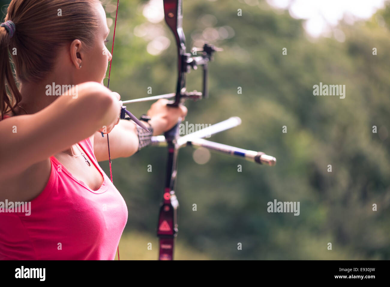 Woman with the bow Stock Photo - Alamy