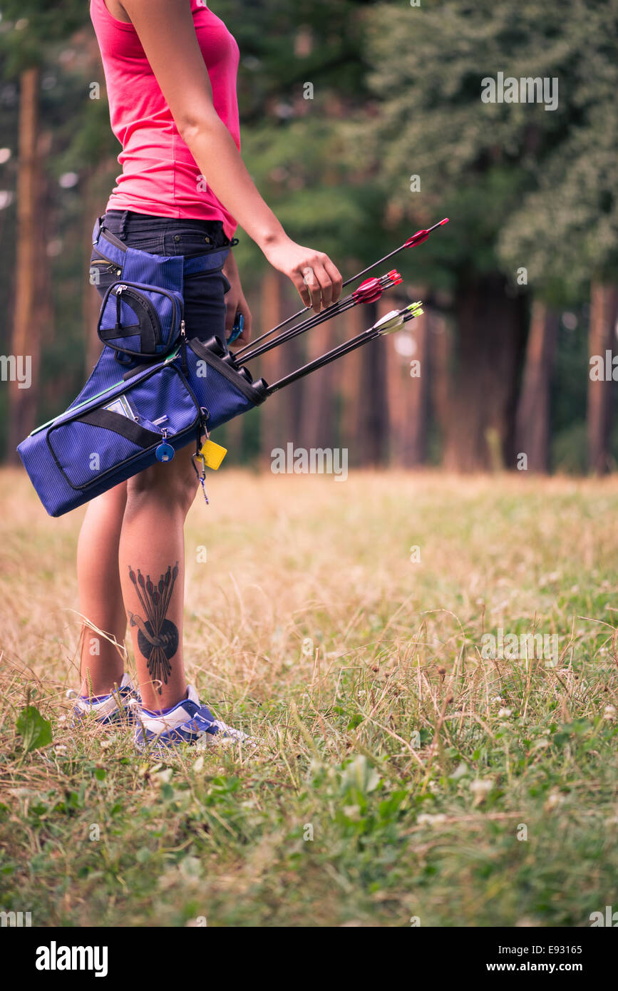Woman with the bow Stock Photo - Alamy