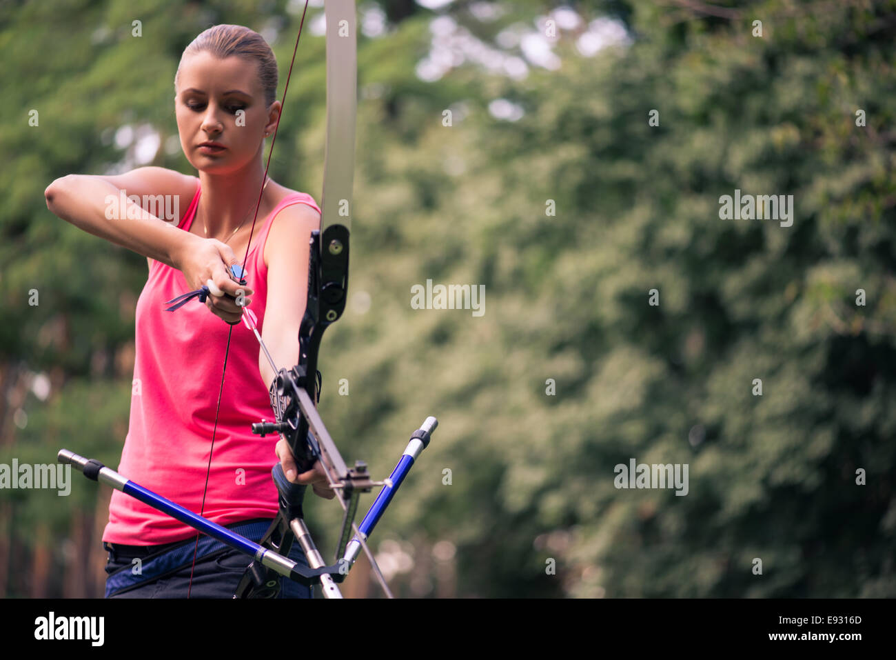 Woman with the bow Stock Photo - Alamy