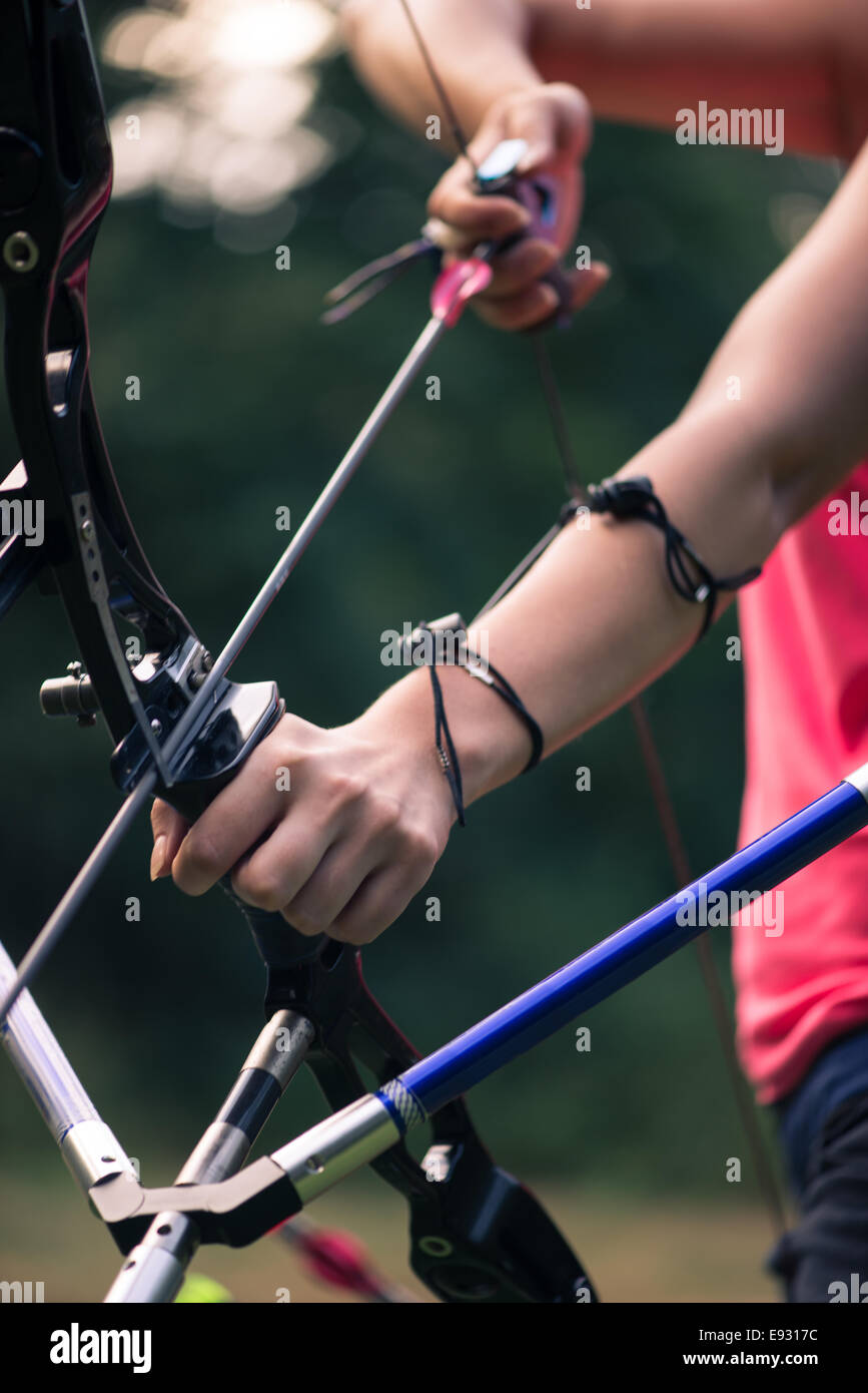Woman with the bow Stock Photo - Alamy